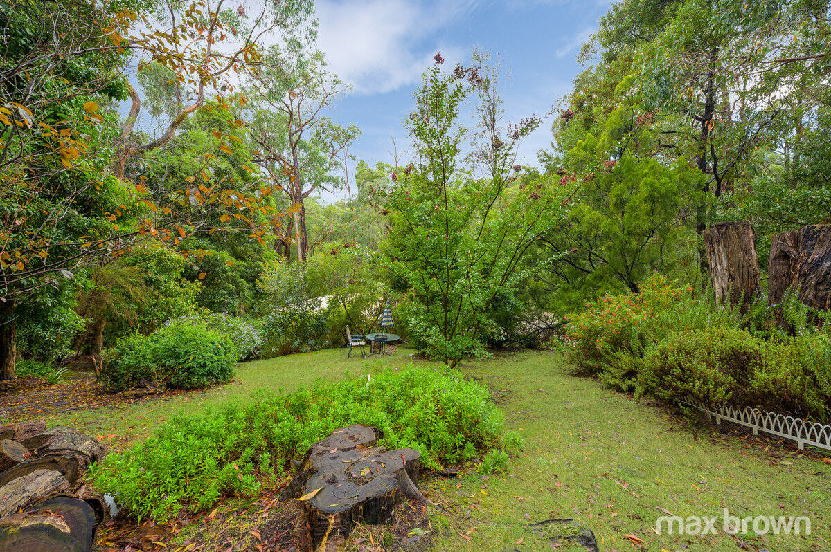 CLASSIC FASHAM JOHNSON HOME ON RUSTIC ½ ACRE - Max Brown Real Estate Group